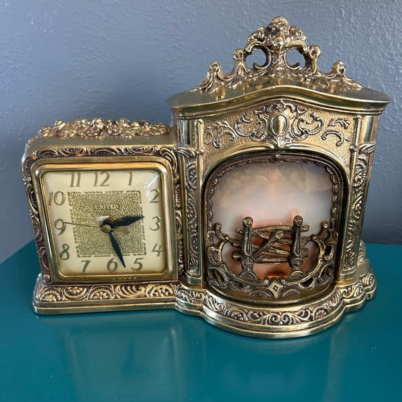 united clock co | Wall Decor | Vintage Gold Table Clock With Fireplace ...